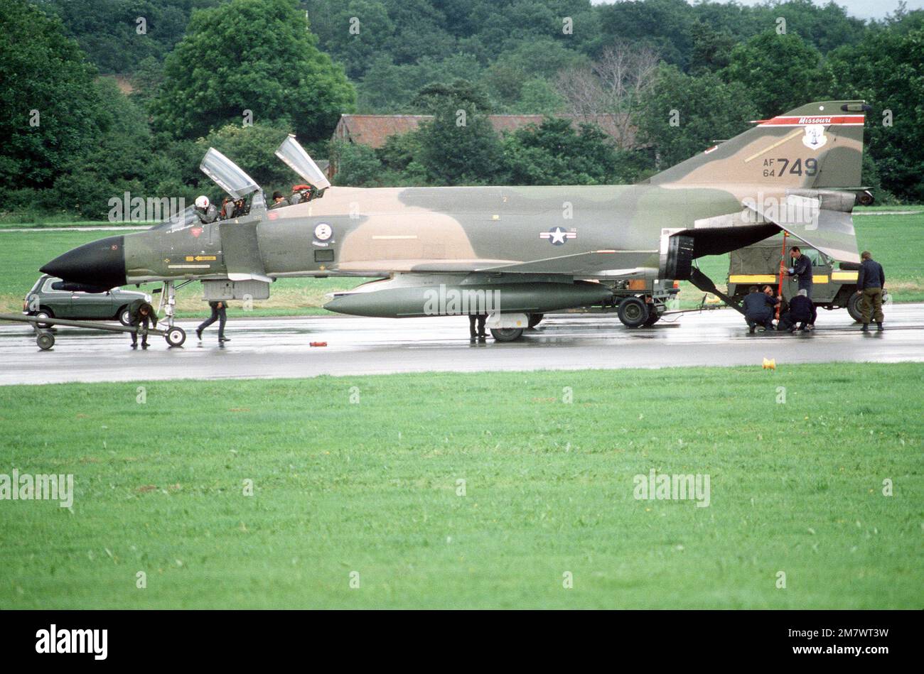 Left side view of an F-4C Phantom II aircraft as pilots prepare to ...
