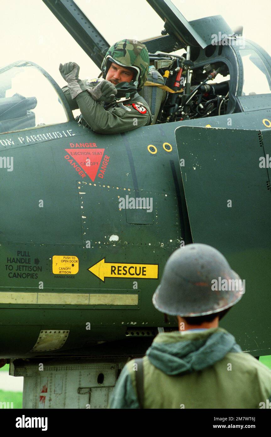 A pilot prepares to deplane an F-C Phantom II aircraft during chemical ...