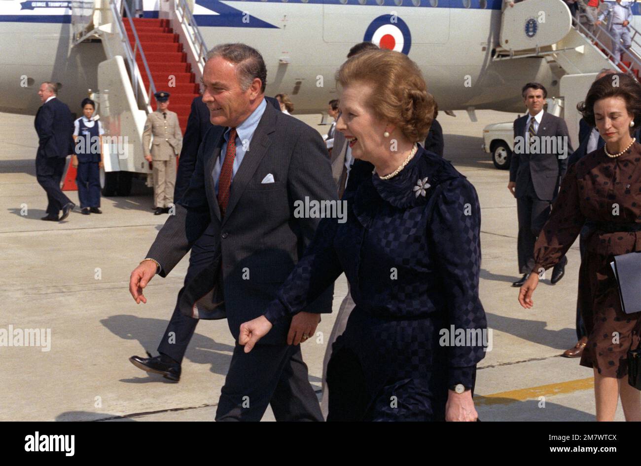 Prime Minister Margaret Thatcher of England is welcomed by Secretary of ...