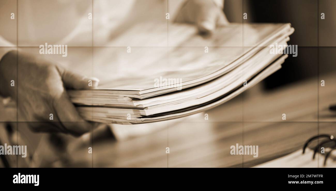 Pile of magazines with hands hi-res stock photography and images - Alamy