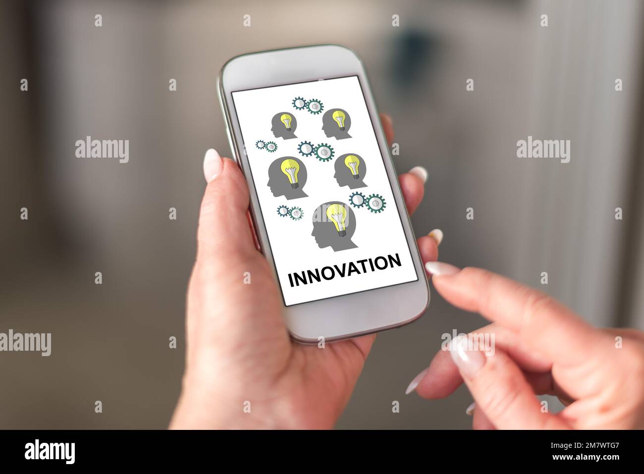 Innovation concept on a smartphone held by a hand Stock Photo - Alamy