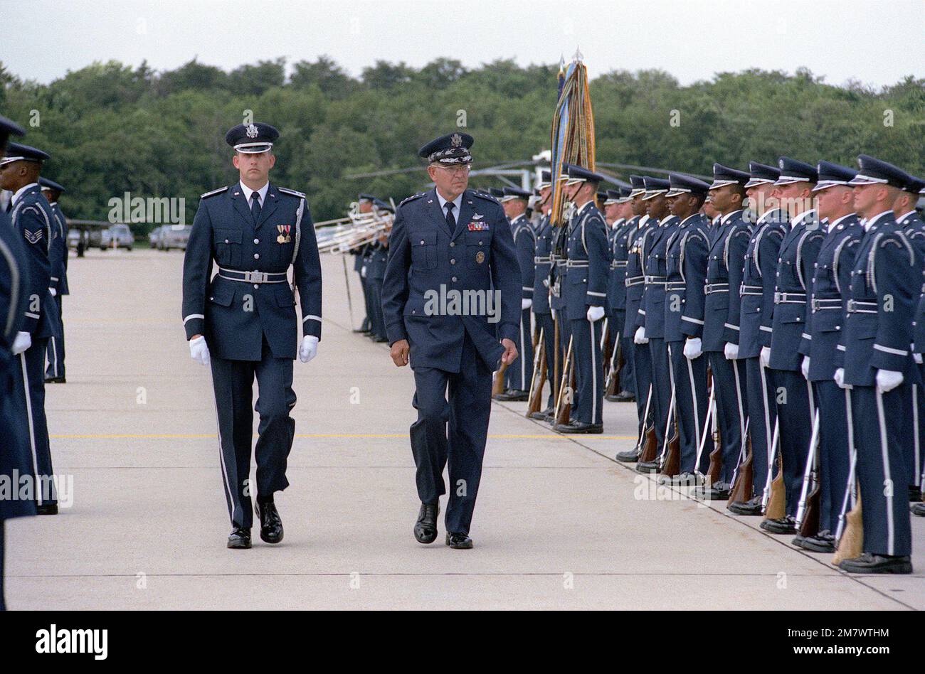 GEN Lew Allen Jr., right, inspects the Air Force personnel ...