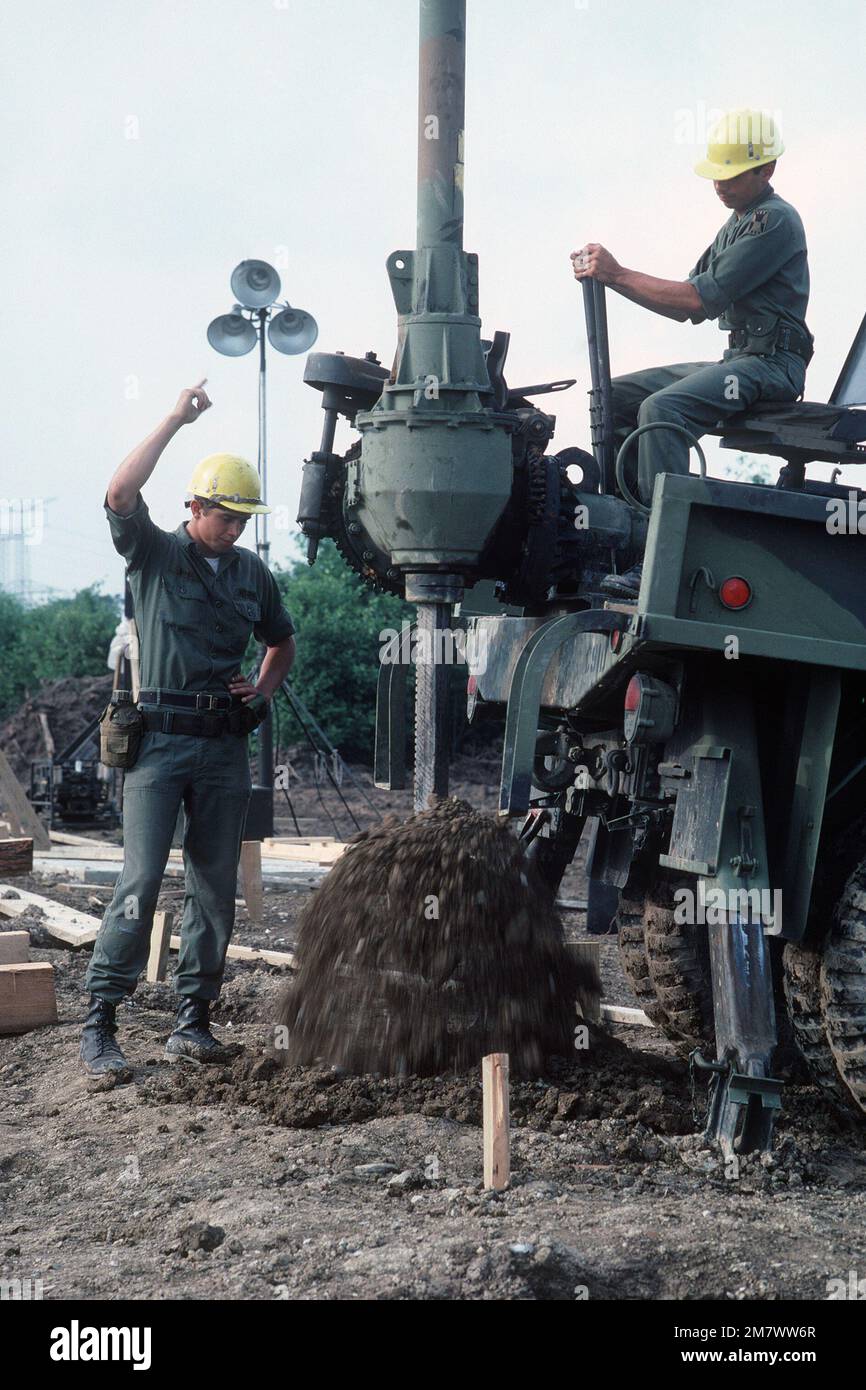 US Army engineers bore a hole for a construction project. Country ...