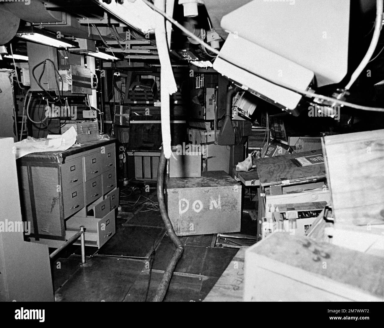 An interior view of the combat information center on the guided missile ...