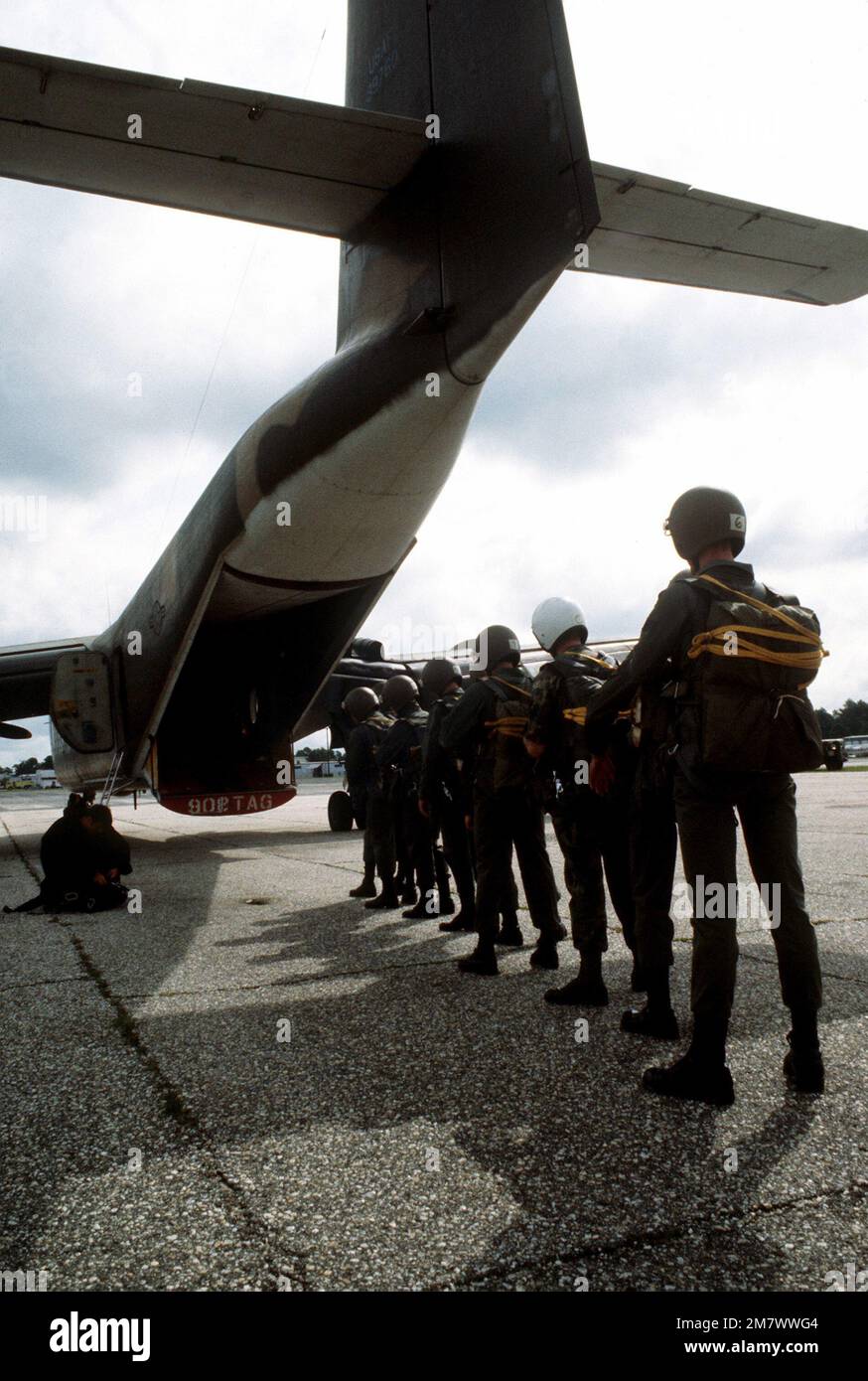 Combat Control School students wait in line to embark a C-7A Caribou ...