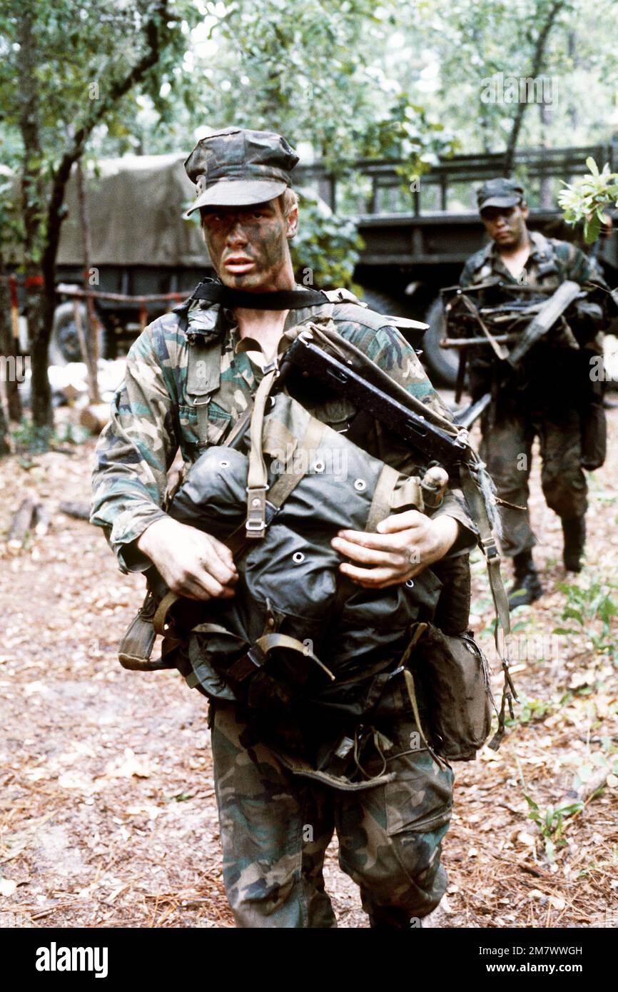 Combat Control School students prepares to cross a river. The students ...