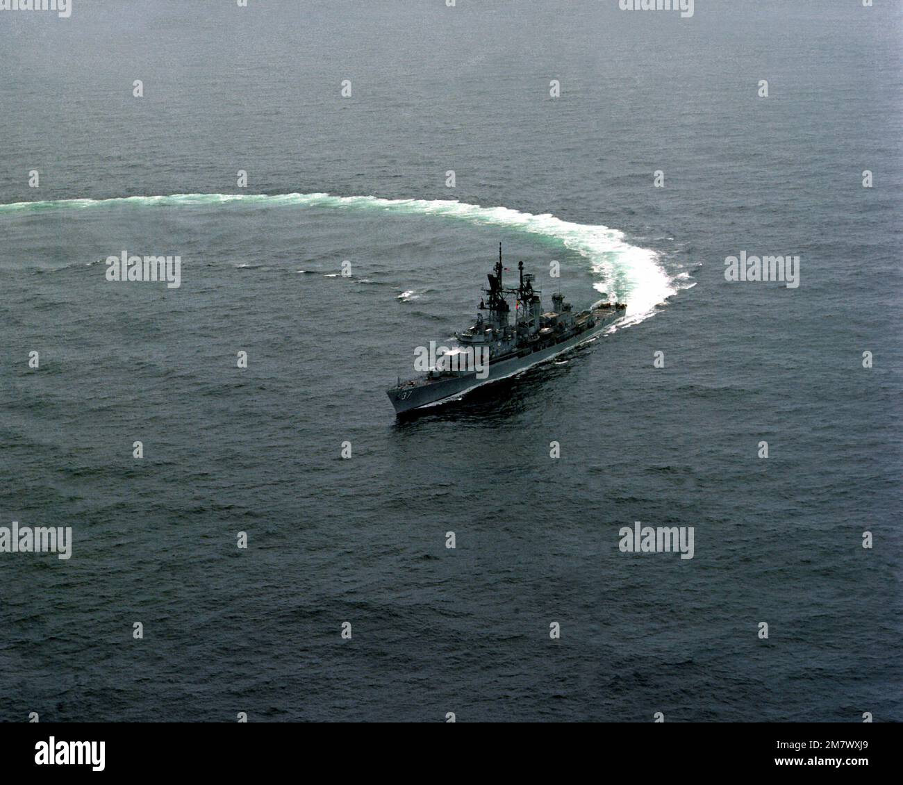 A port bow view of the guided missile destroyer USS FARRAGUT (DDG-37 ...