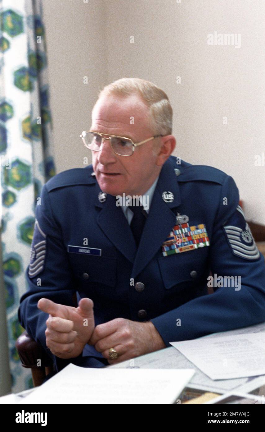Candid photo of CMSGT Arthur L. Andrews in his office. Country: Unknown ...