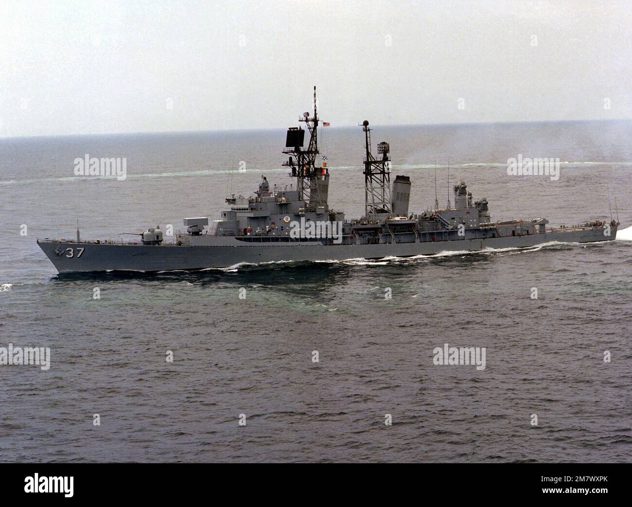 An aerial port beam view of the guided missile destroyer USS FARRAGUT ...