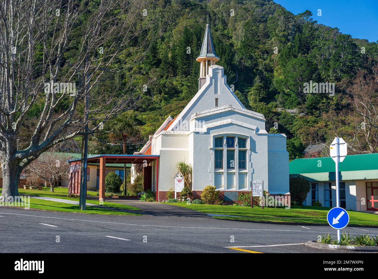 A view of St. Mark's Anglican Church in Te Aroha in sunlight with trees ...