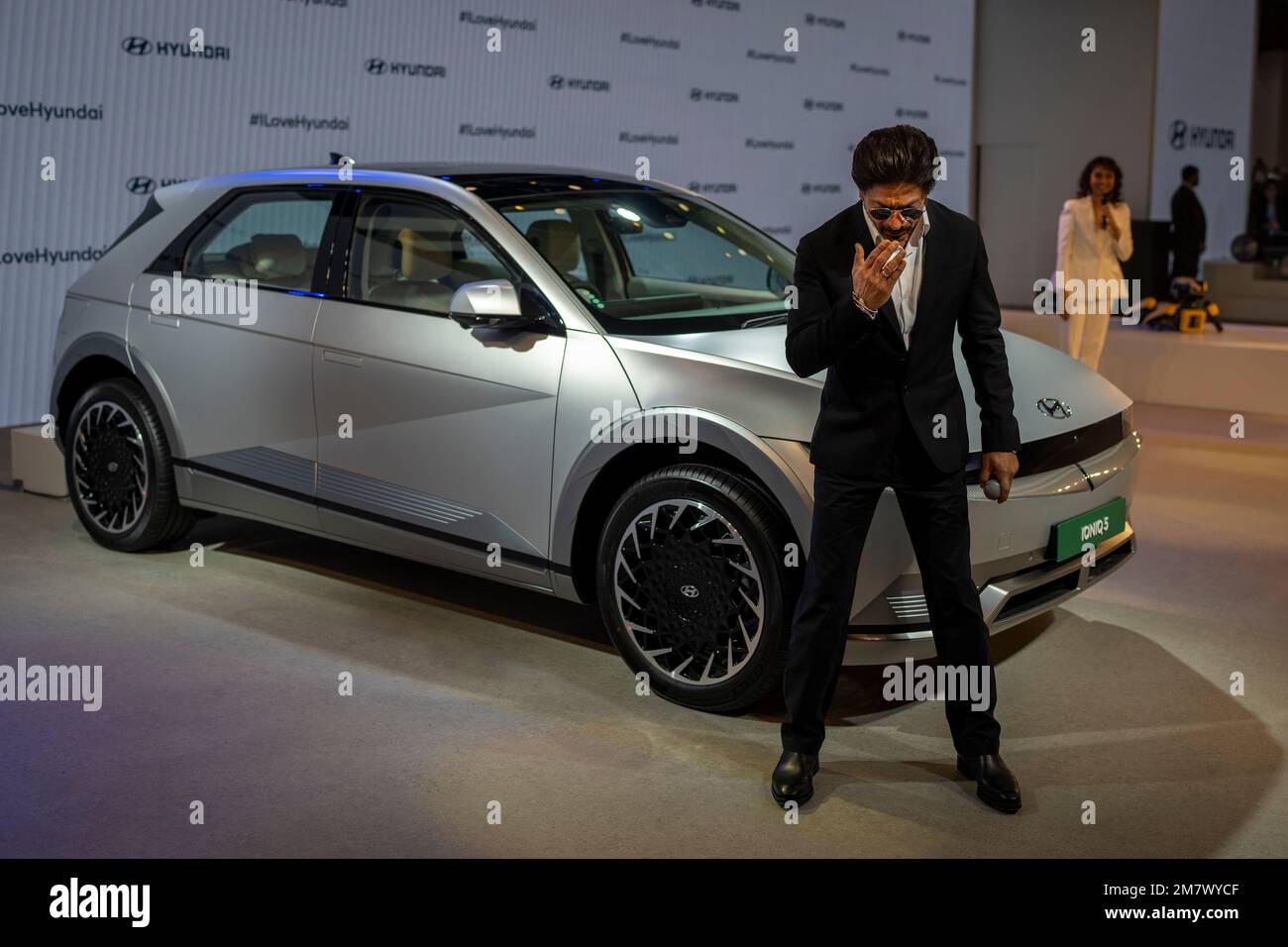 Bollywood actor and brand ambassador of Hyundai Shah Rukh Khan greets the crowd during the ...