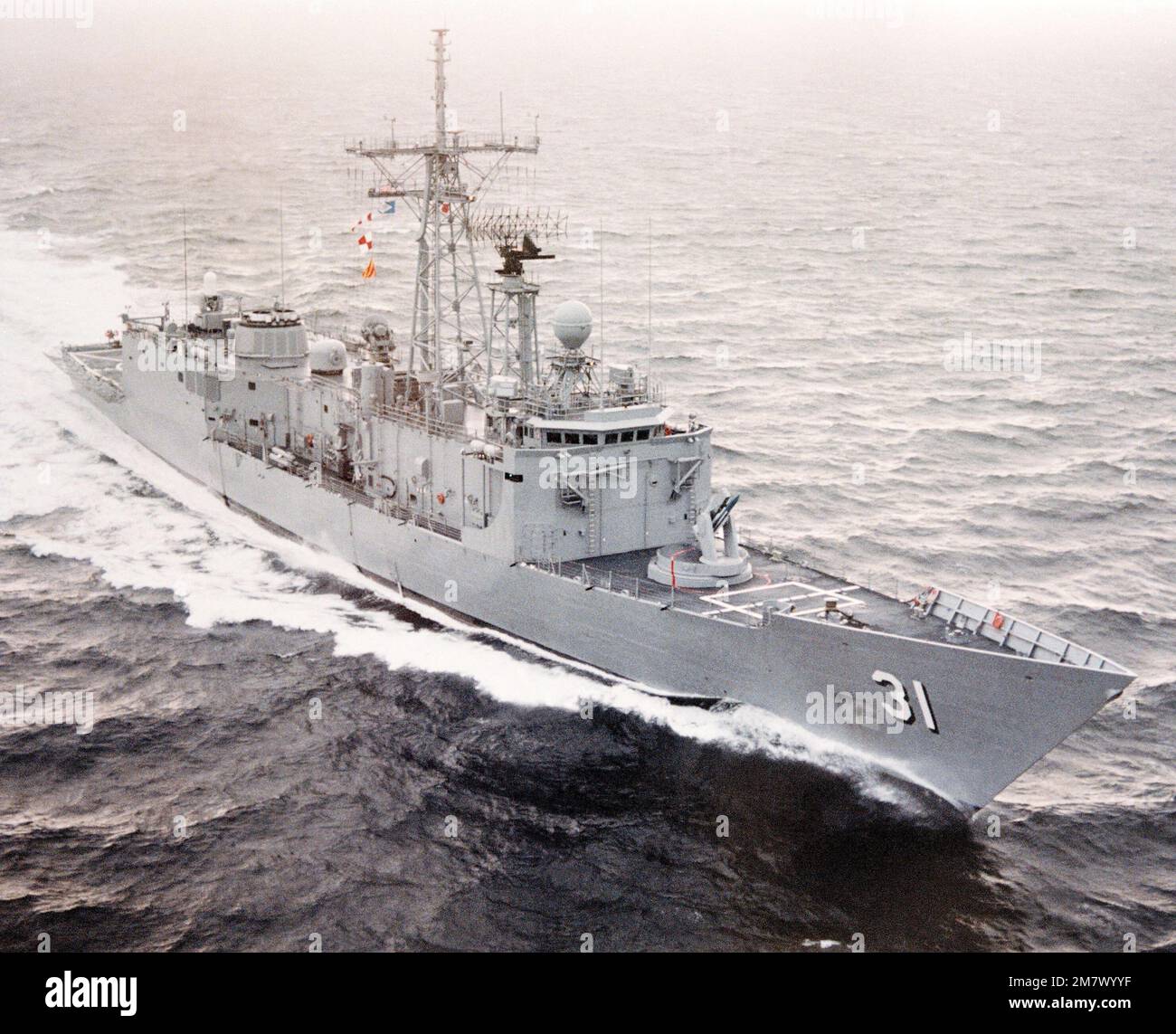 An aerial starboard bow view of the guided missile frigate STARK (FFG ...