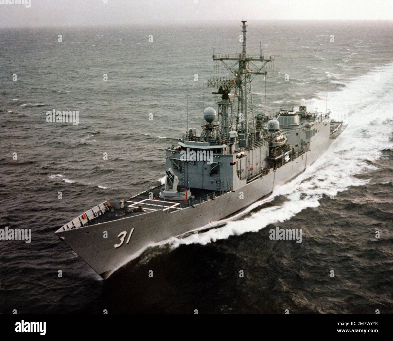 An aerial port bow view of the guided missile frigate STARK (FFG-31) as ...