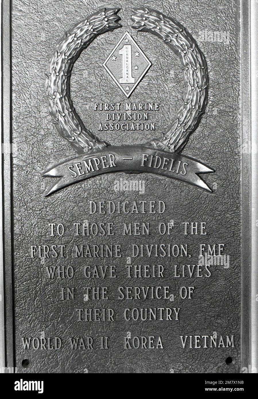 1ST Marine Division Association members presents a plaque to the Edson ...