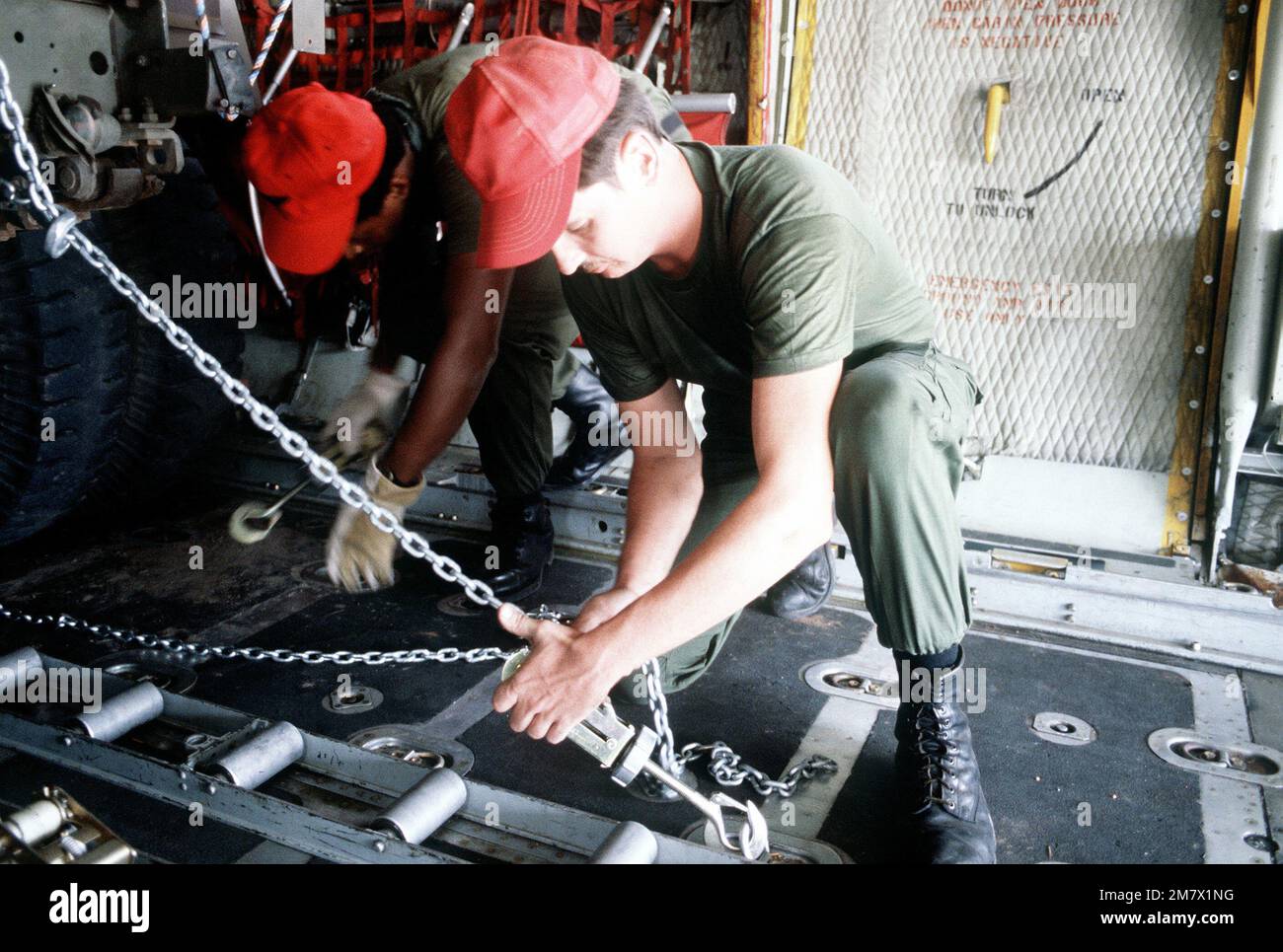 Members of the 1300th Military Airlift Squadron airlift control element ...