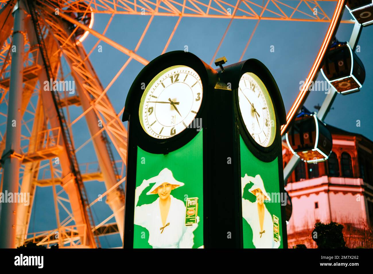 Big clock near Ferris wheel in the Dusseldorf city Stock Photo - Alamy
