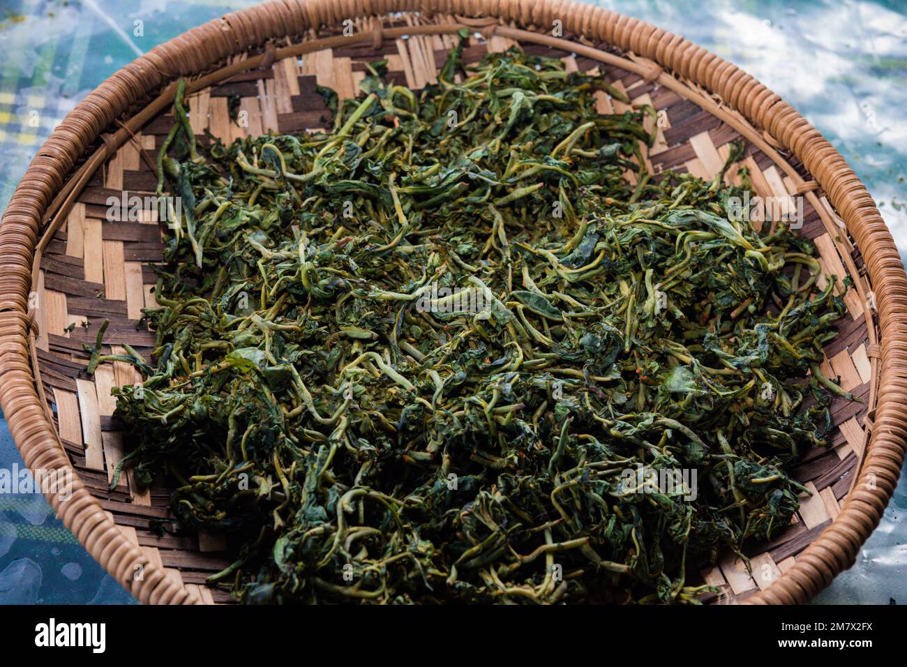 Kenyan Tea green leaves cooking drying up processing traditional way ...