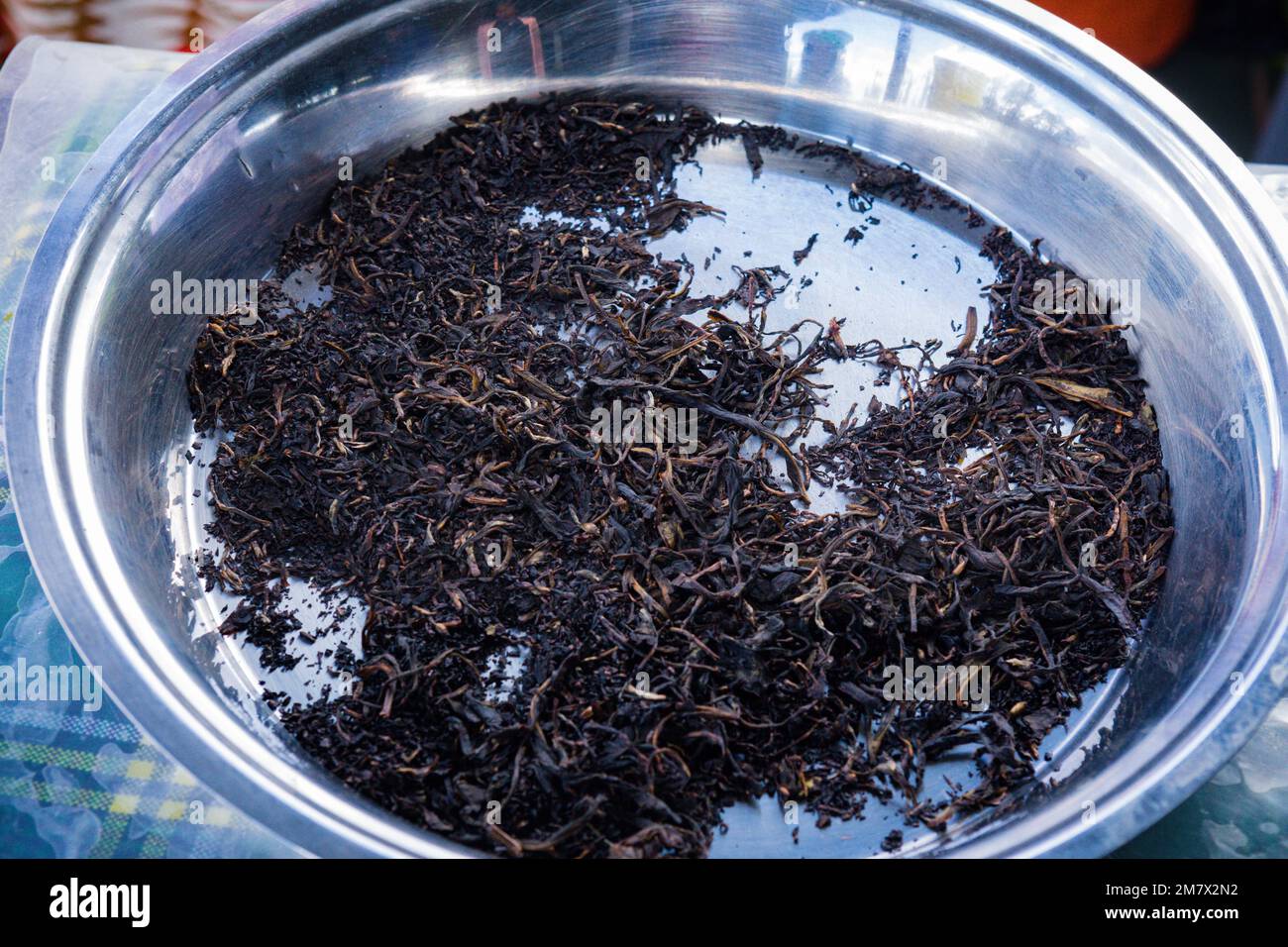 Kenyan Tea green leaves cooking drying up processing traditional way ...
