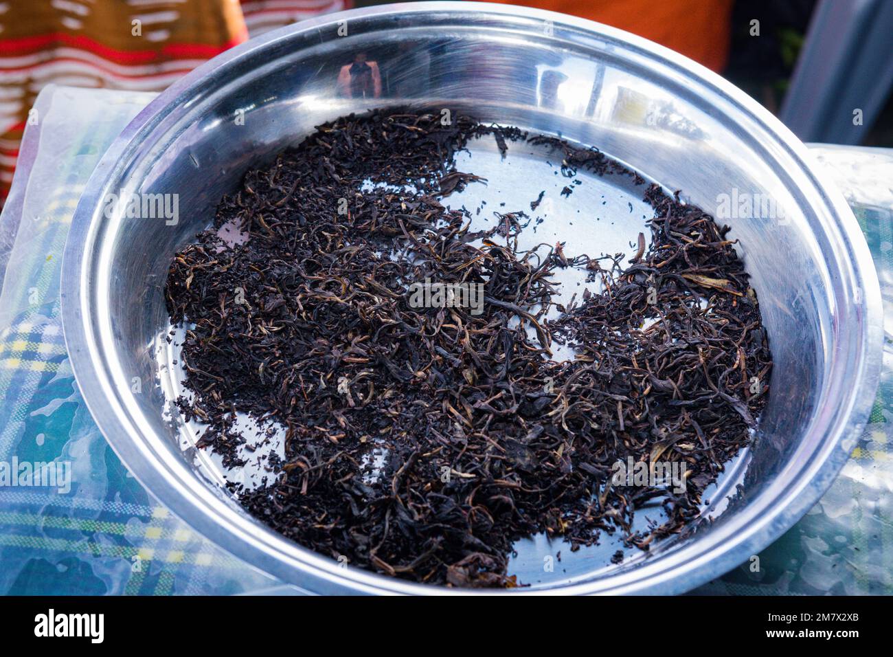 Kenyan Tea green leaves cooking drying up processing traditional way ...