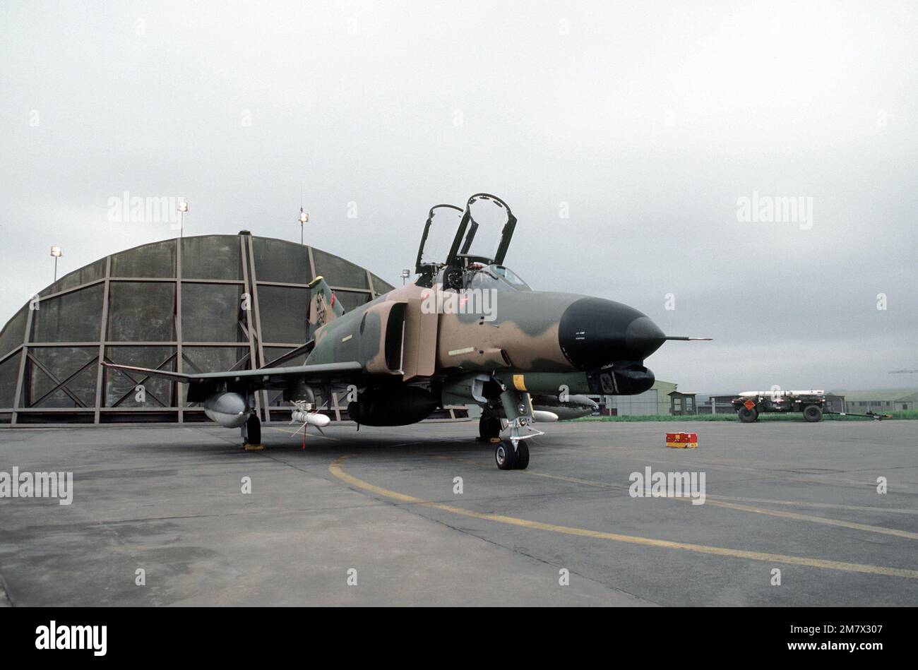 A view of a parked F-4G Phantom II aircraft armed with AGM-45 Pave ...