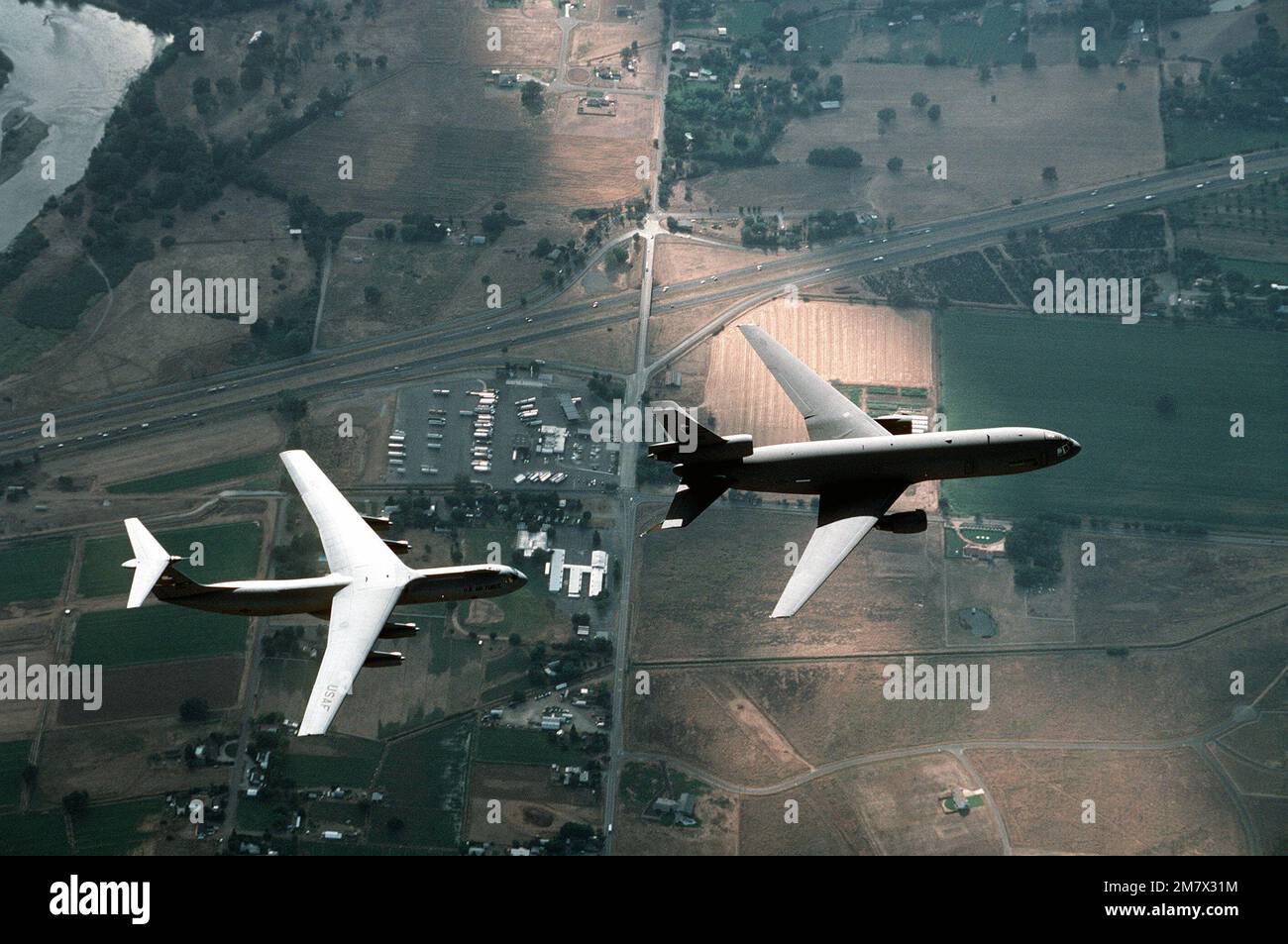 Air to air top view of an USAF's Air Mobility Command, C-141B ...