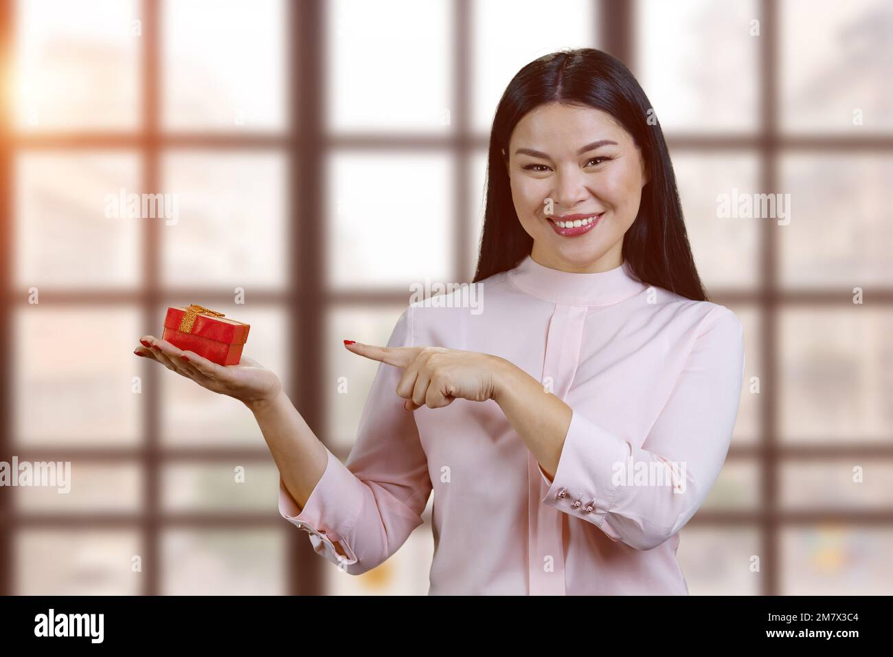 Pointing at gift hi-res stock photography and images - Alamy