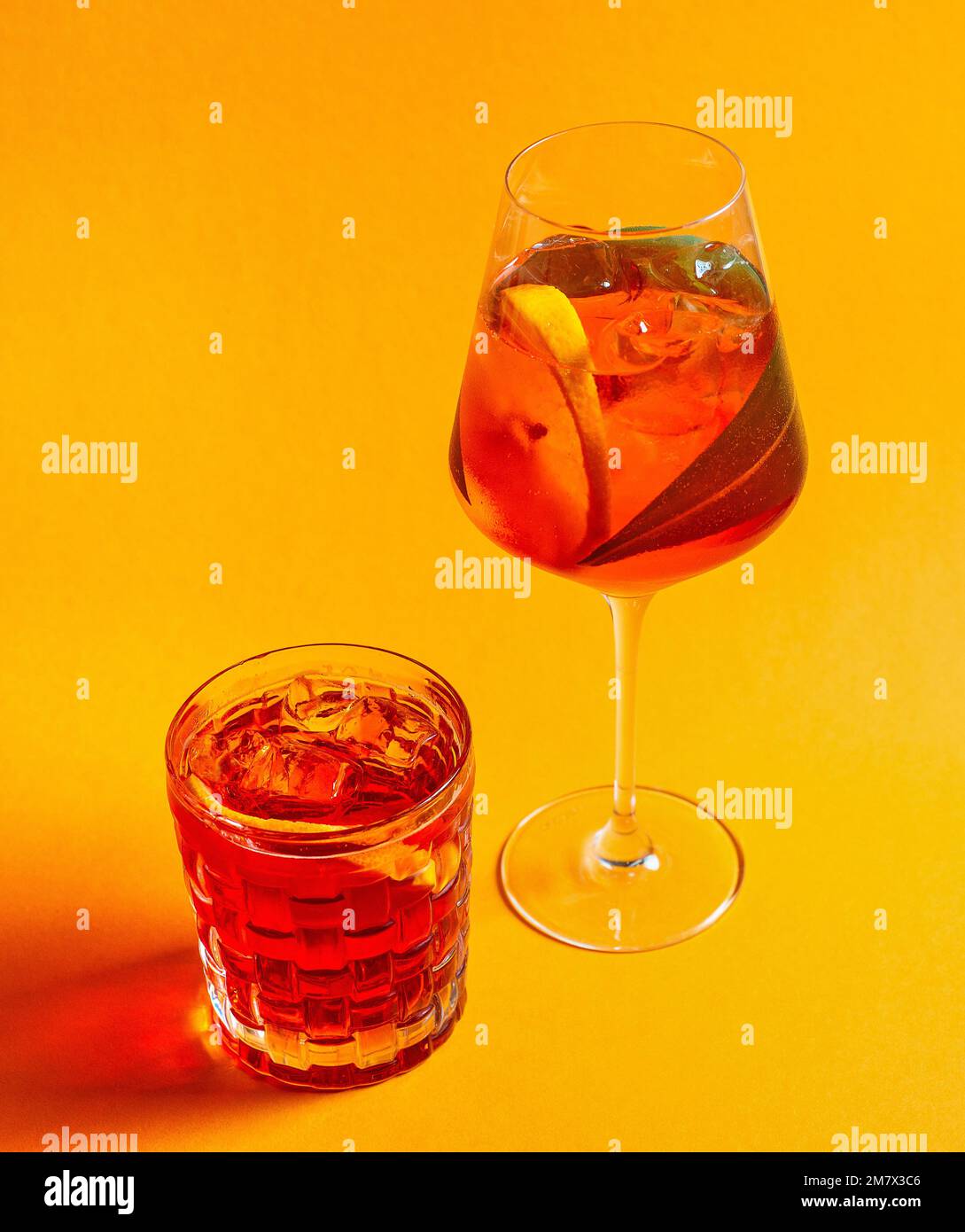 Spritz with sparking wine alcohol Cocktail on orange background Stock ...