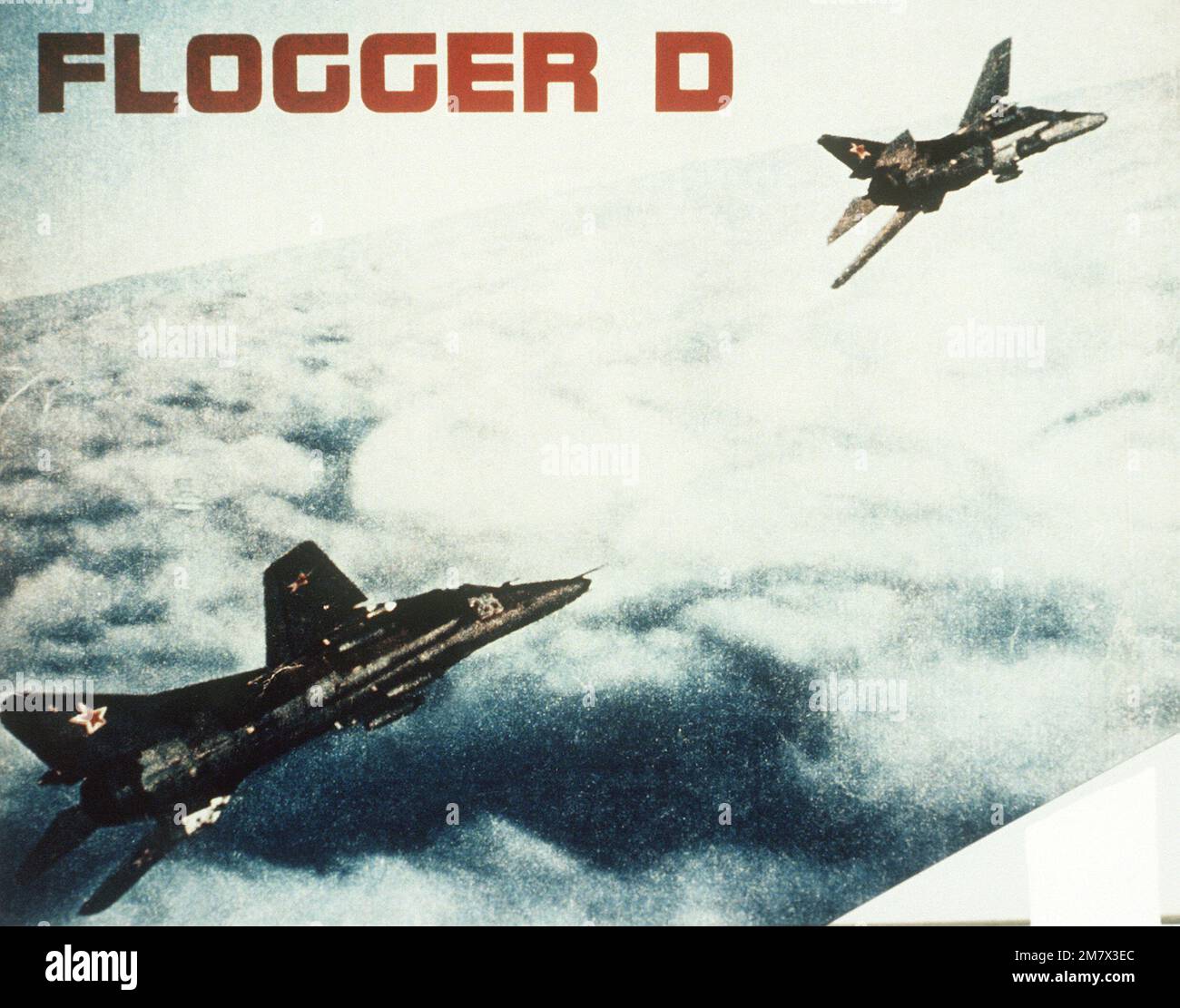 A right side view of two Soviet MiG-27 Flogger-D aircraft in-flight ...