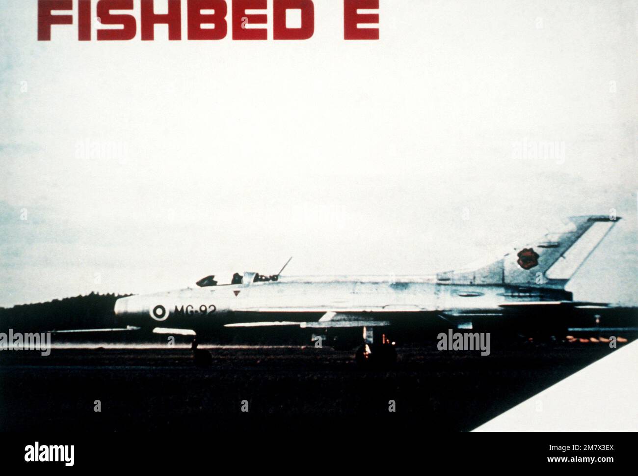 A left side view of a parked Soviet MiG-1 Fishbed-E aircraft. Country ...