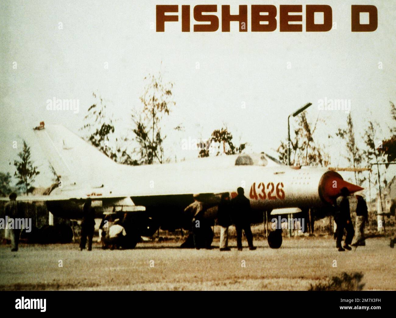 A right side view of a parked Soviet MiG-21PF Fishbed-D aircraft ...