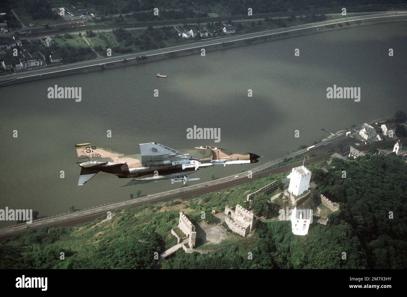 A view of an F-4G Phantom II aircraft banking to the left. The aircraft ...