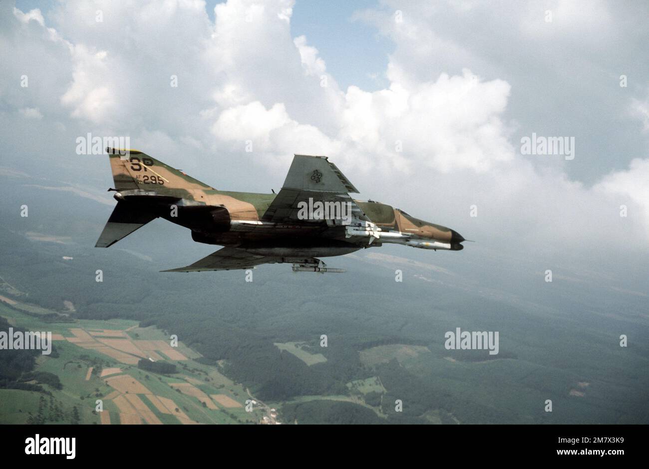 A view of an F-4G Phantom II aircraft banking to the left. The aircraft ...