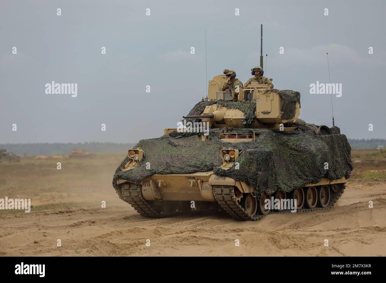From left, U.S. Army Staff Sgt. John Hiles and U.S. Army Spc. Julia ...