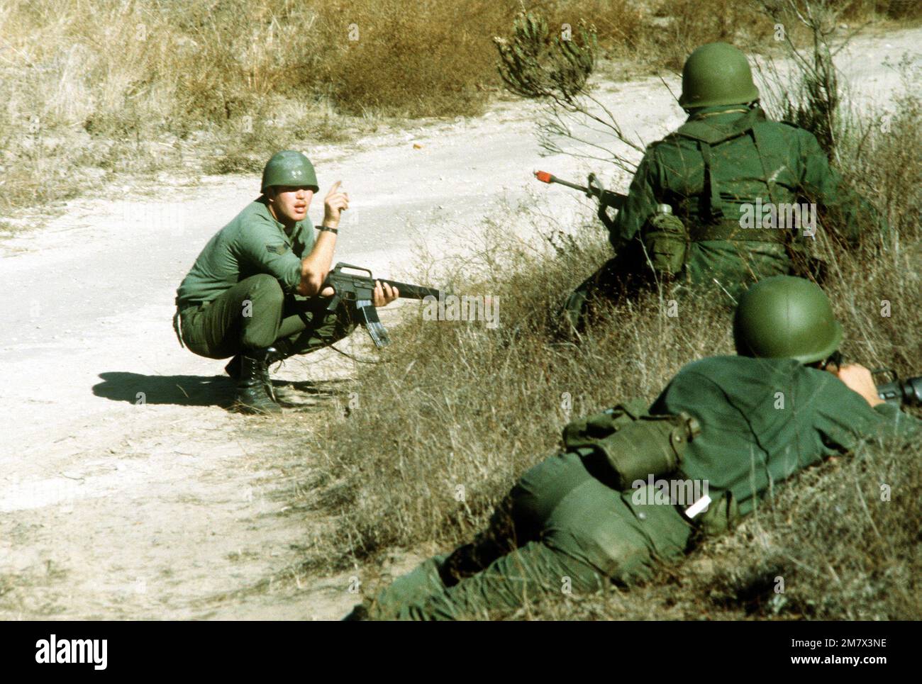 Members of the 4392nd Civil Engineering Squadron armed with M-16 rifles ...