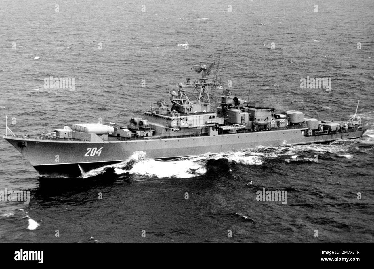 An aerial port bow view of a Soviet Krivak class missile frigate ...