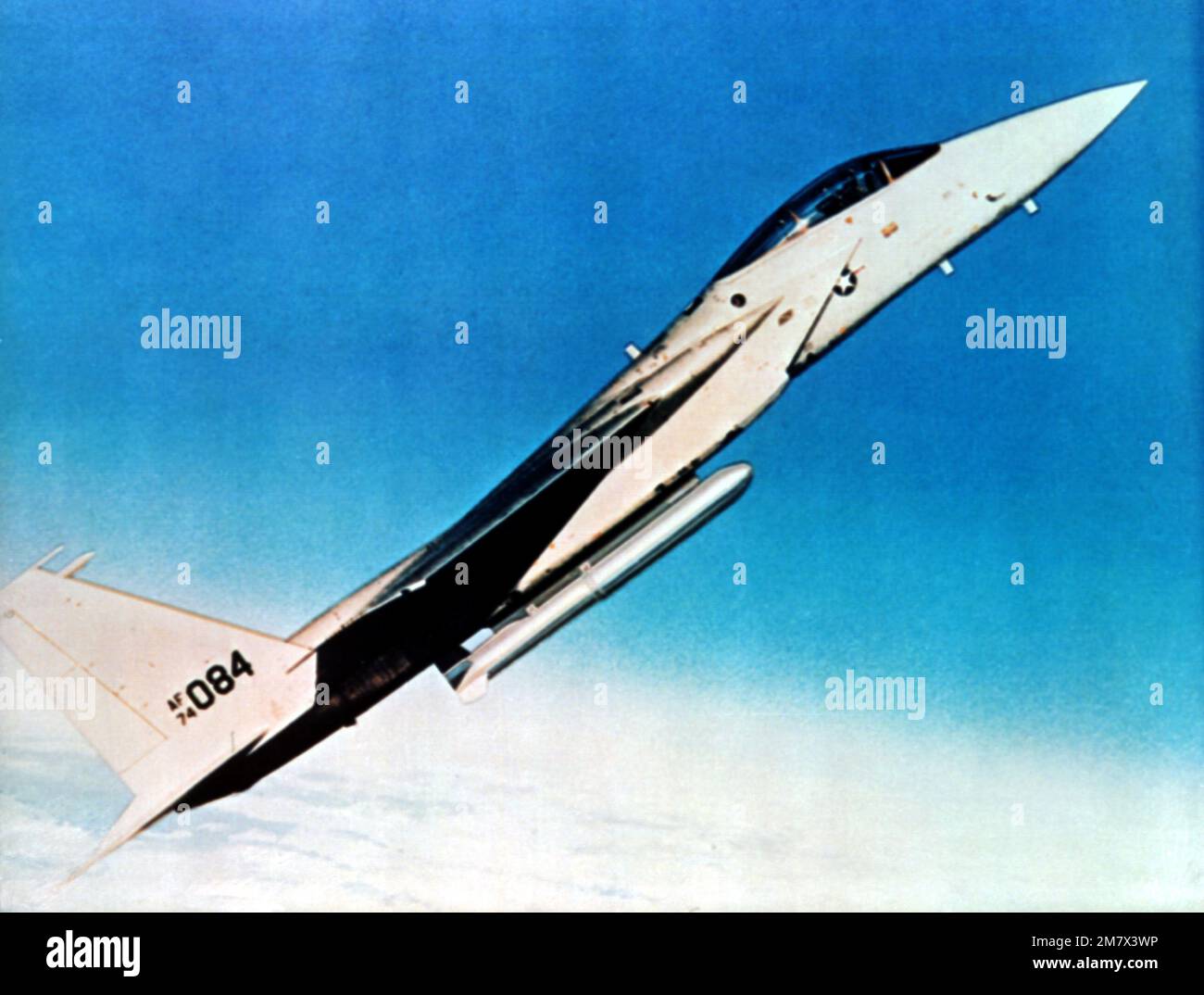 Artist's concept of an F-15 Eagle aircraft in flight with an anti ...