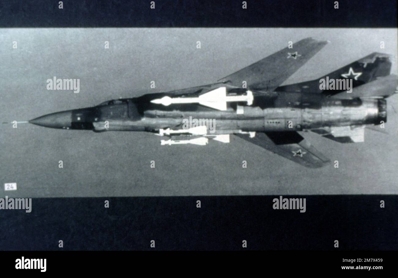 An air-to-air left side view of a Soviet MiG-23 Flogger B aircraft ...