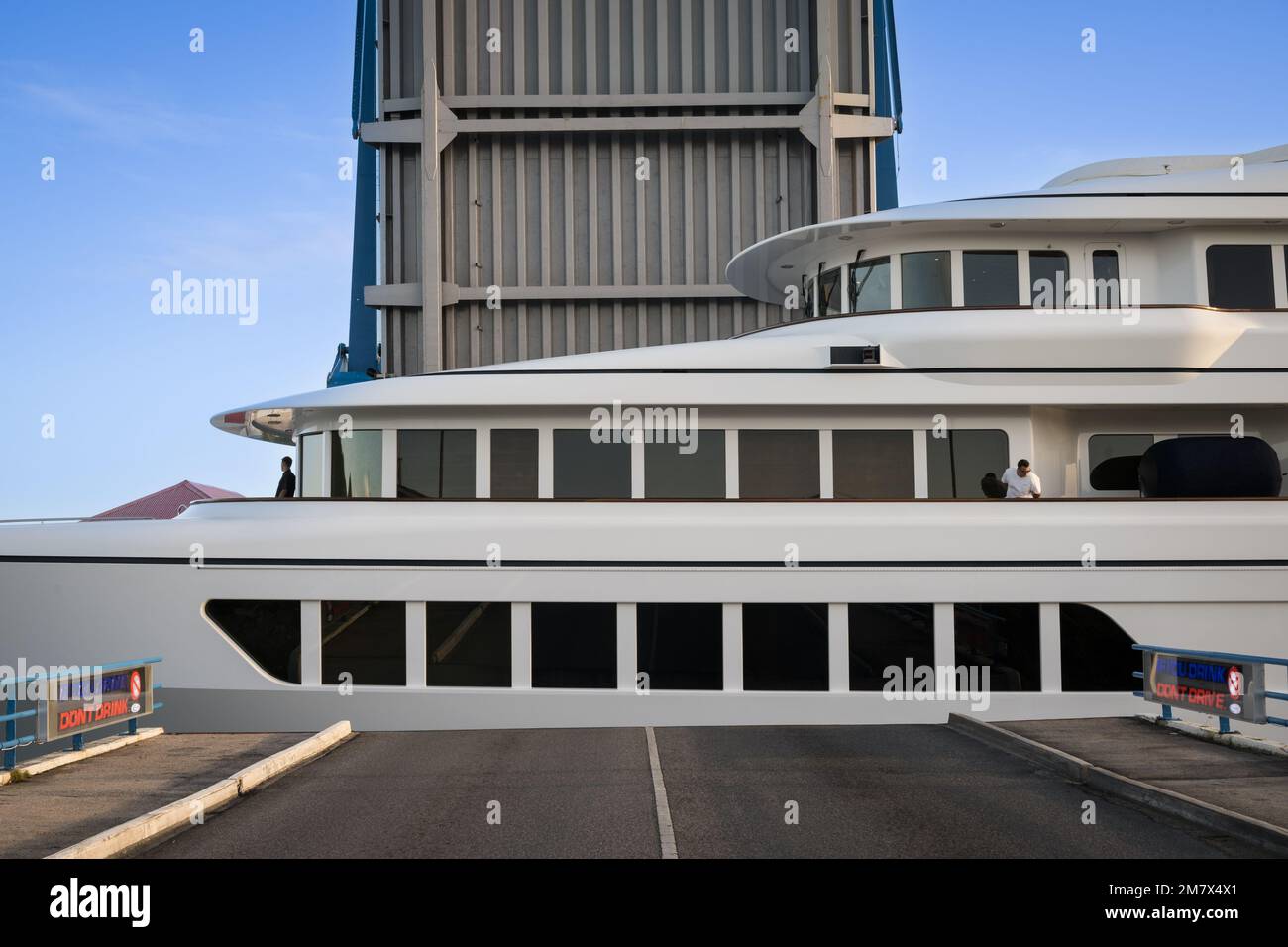 Simpson Bay, Sint Marten - January 2023: Superyachts creep through the ...