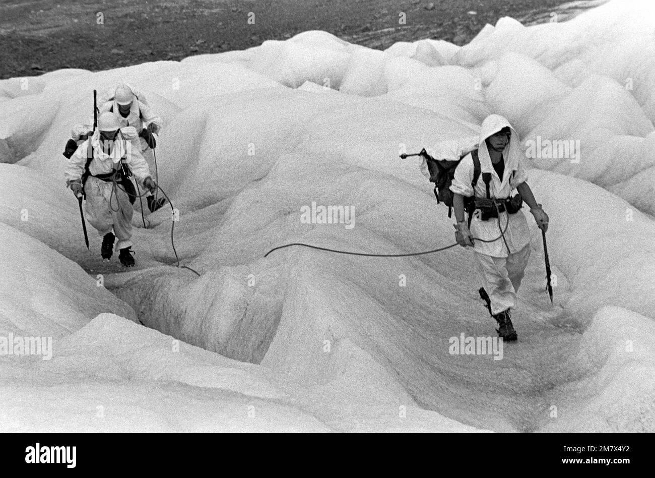 1LT Paul Woerner, Co. E, 1ST Bn., 60th Regt., leads a group across the ...