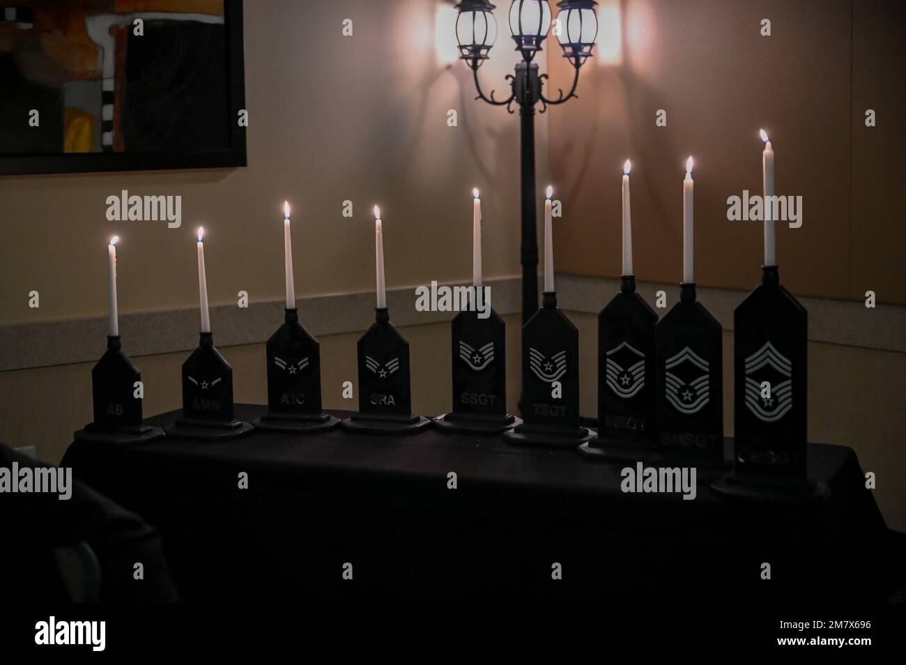 All nine candles are lit representing each of the nine enlisted ranks ...
