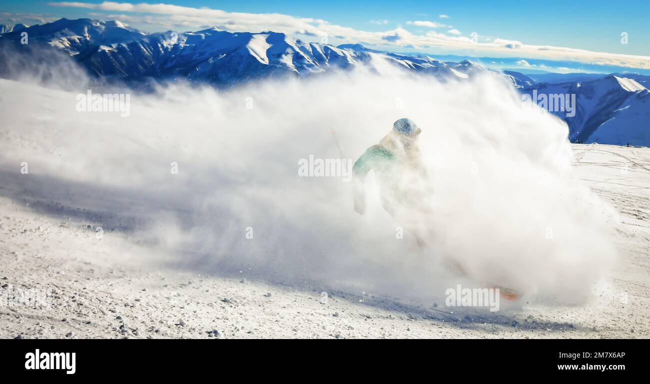 Dynamic picture of a skier on the piste in Alps. Woman skier in the ...