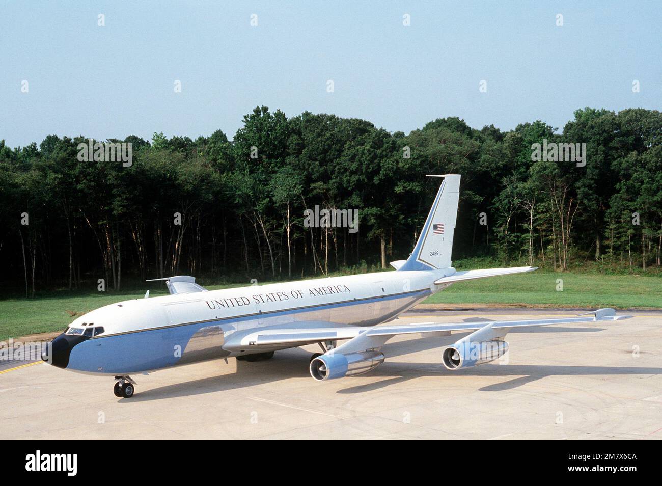 A left front view of a VC-135 aircraft parked on the runway apron. Base: Andrews Air Force Base ...