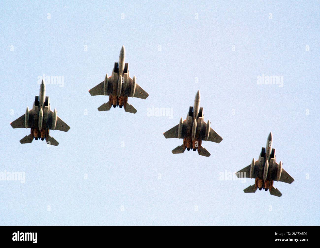 A view looking up of four F-15 Eagle aircraft from the 33rd Tactical ...