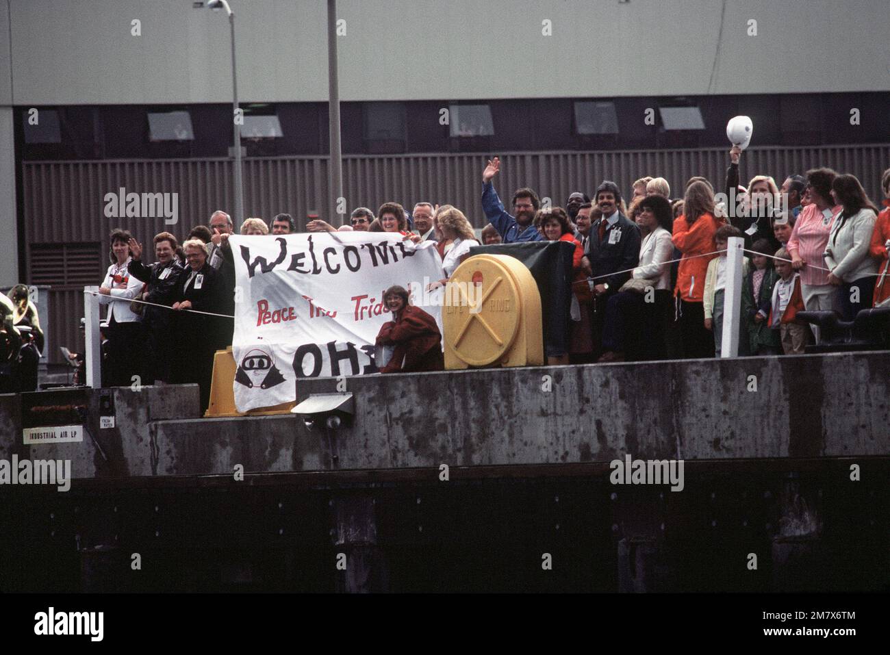 A crowd at Delta Pier welcomes the nuclear-powered strategic missile ...