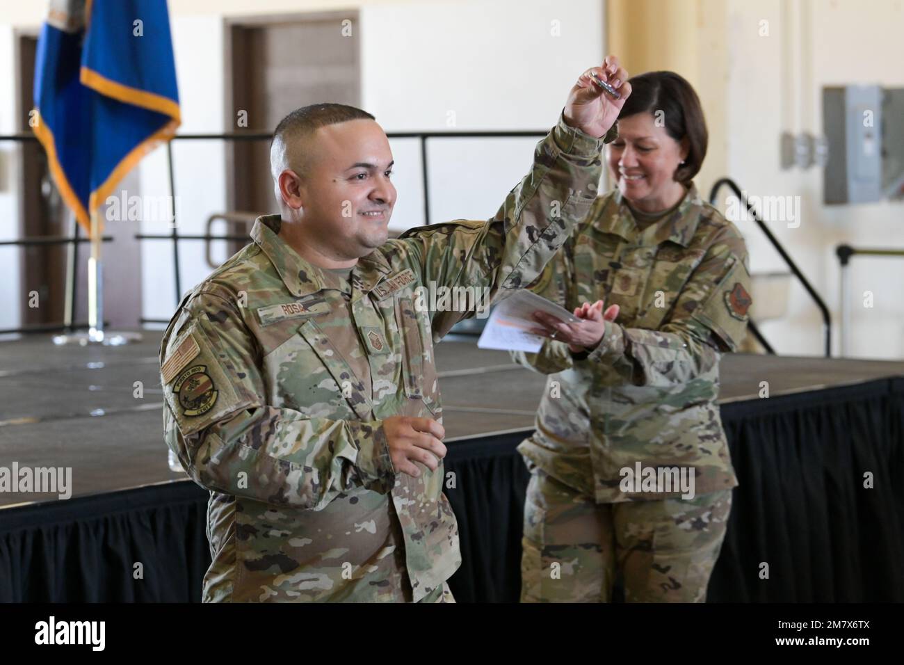Chief Master Sgt. of the Air Force JoAnne S. Bass presents her coin to ...