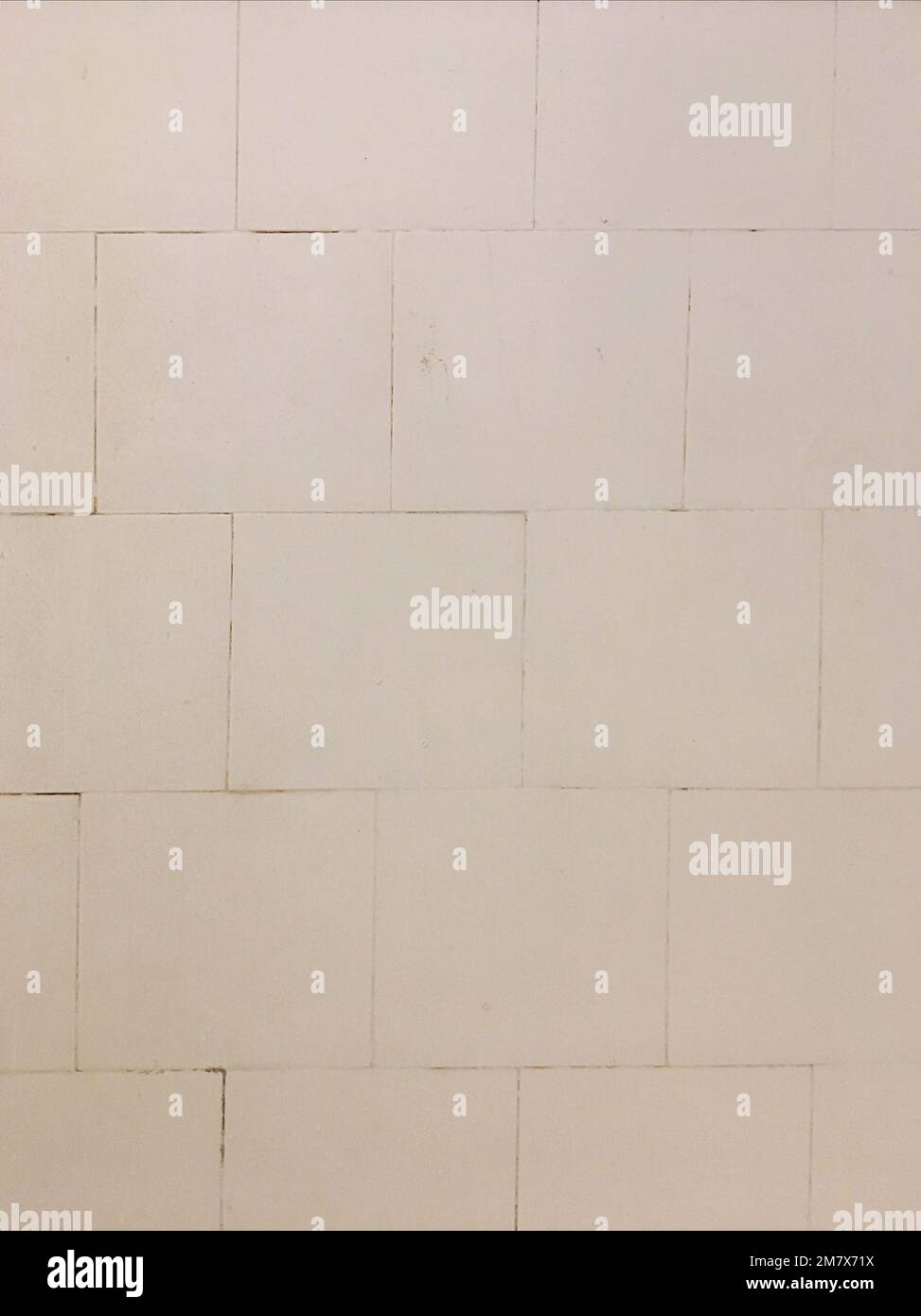 White bathroom with white rectangular tiles hi-res stock photography ...