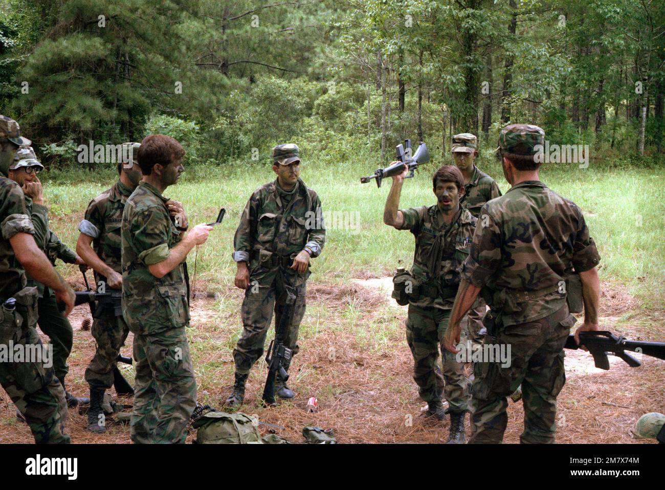 Cadet McGinney, Officer Candidate School team leader, briefs his team ...