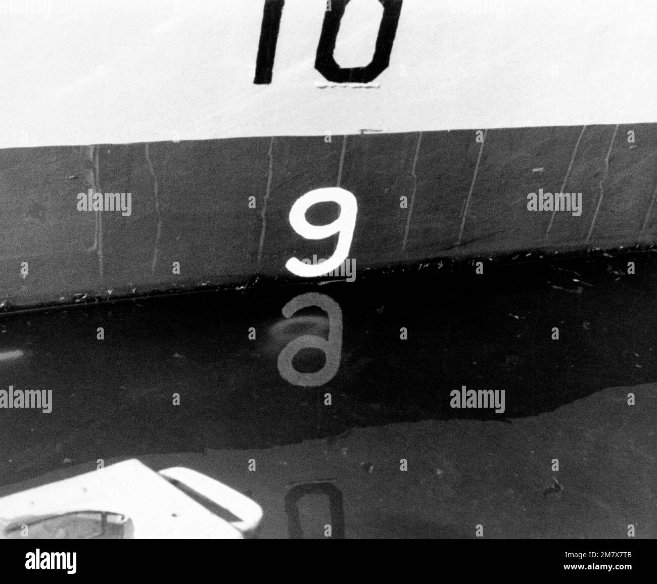 A view of the forward port draft marks on the hull of the PCG-612 class ...