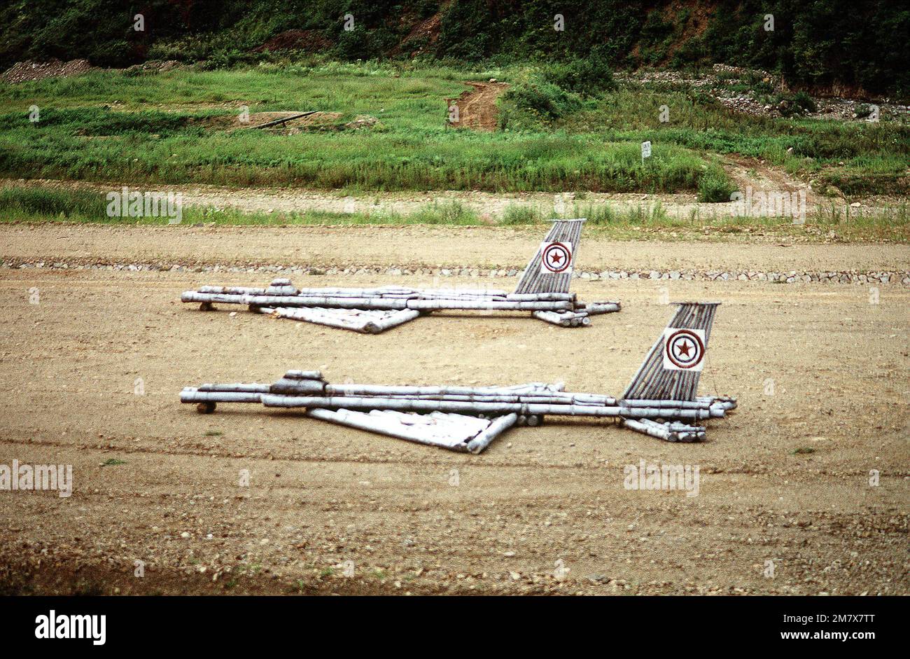 A view of two bamboo aircraft mock-ups used for air-to-ground target ...