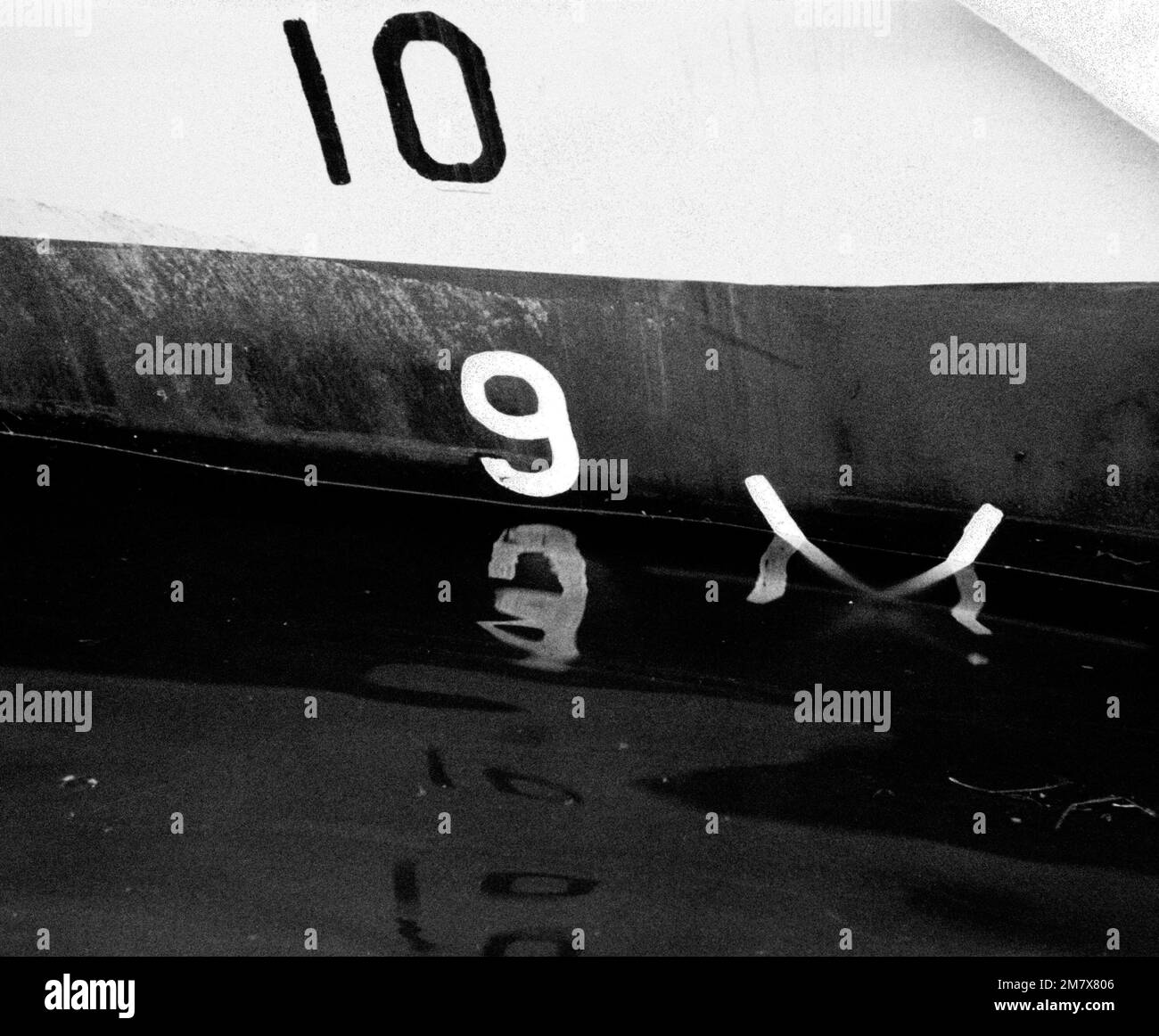 A view of the forward starboard draft marks on the hull of the PCG-612 ...